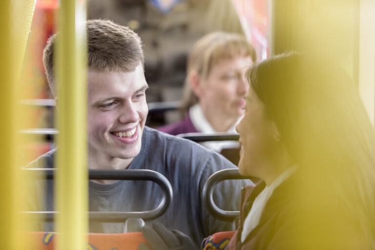 Passengers talking to each other on electric bus – VPT